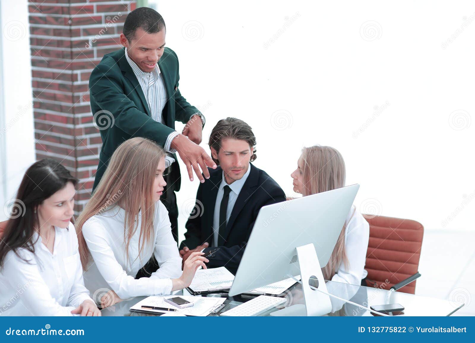 Business Team Discussing Business Issues in a Modern Office Stock Photo ... Business Team Discussing Business Issues in a Modern Office Stock Photo ...