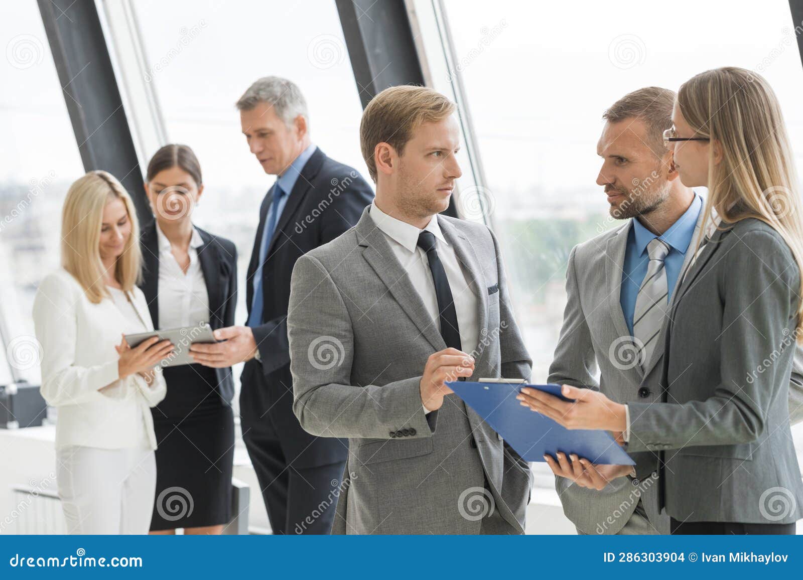 Business Team Discussing Documents Stock Photo - Image of paperwork ...