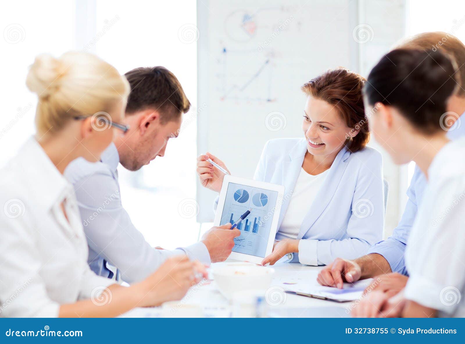 Business Team Discussing Graphs in Office Stock Image - Image of ...