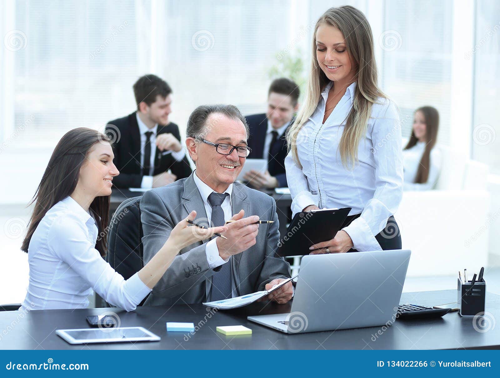 Business Team Discussing with the Head of Financial Data Stock Photo ...