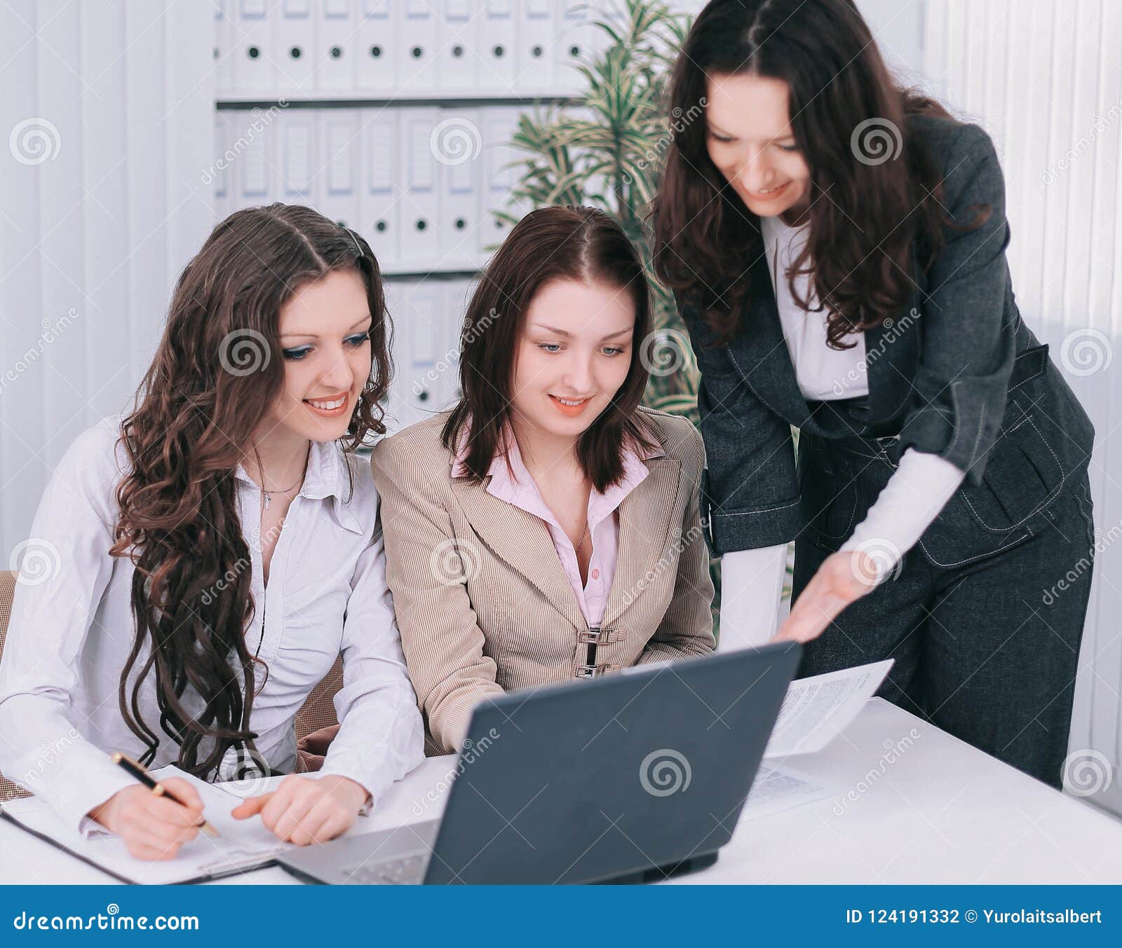 Business Team Discussing Information Obtained through Laptop. Stock ... Business Team Discussing Information Obtained through Laptop. Stock ...