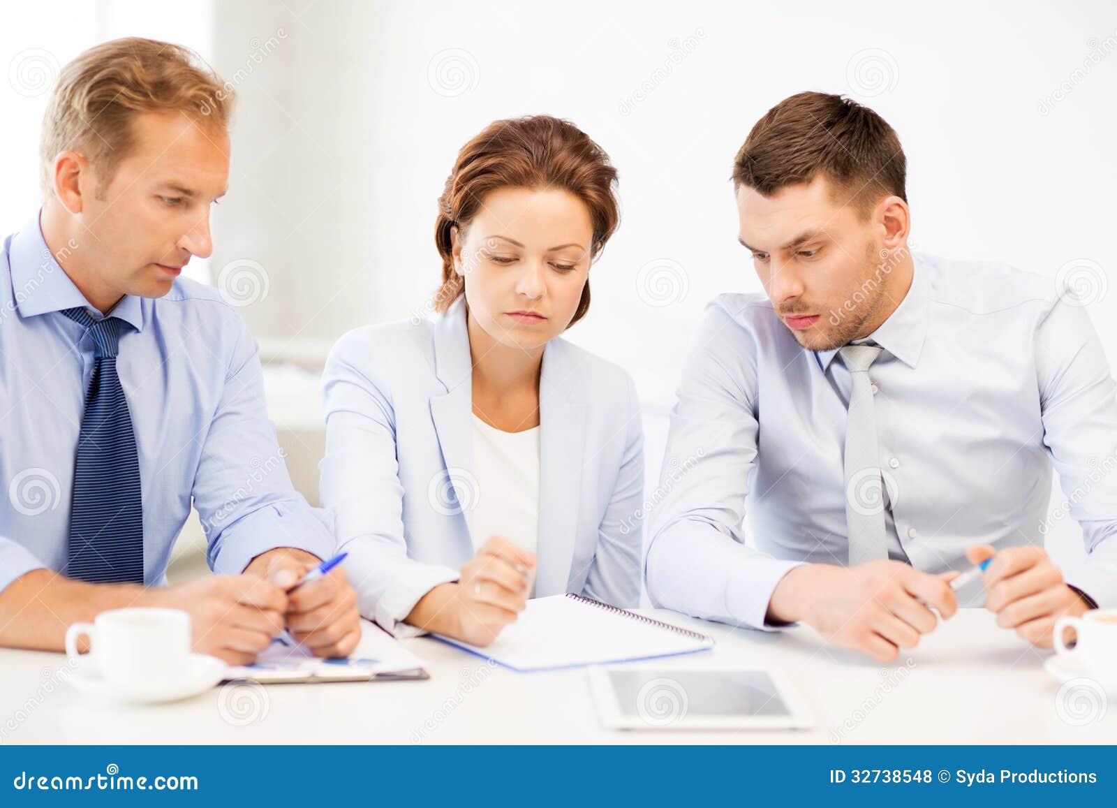 Business Team Discussing Something in Office Stock Photo - Image of ...