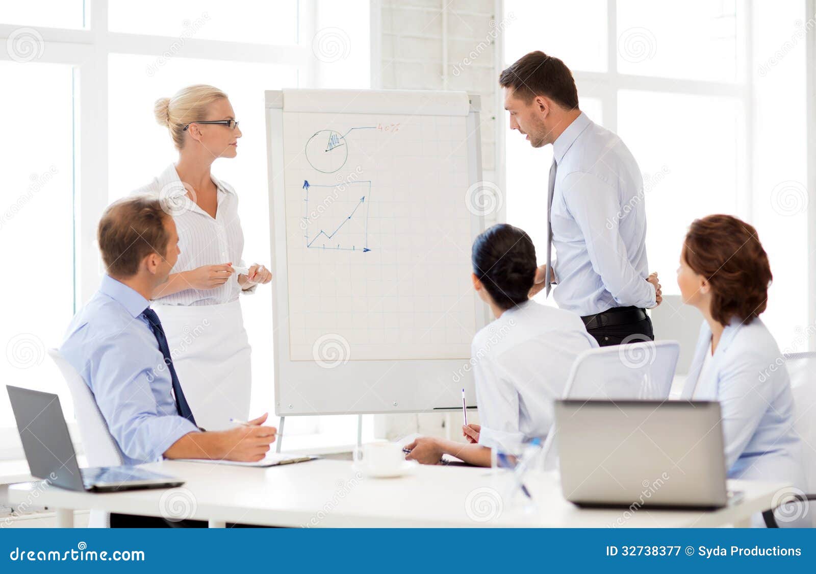 Business Team Discussing Something in Office Stock Image - Image of ...