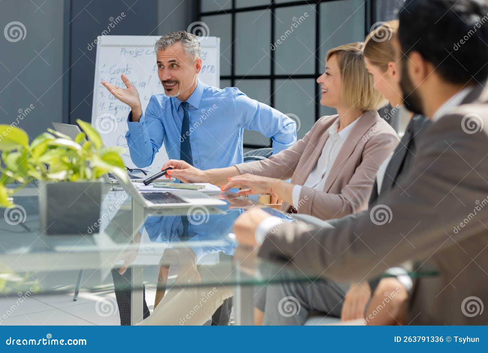 Business Team Discussing Together Business Plans in Office. Stock Photo ...