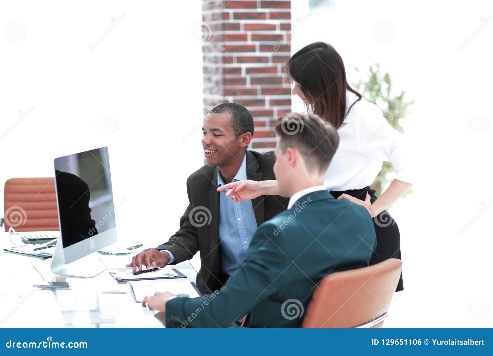 Business Team Discussing Work Problems Sitting at Their Desk Stock ...