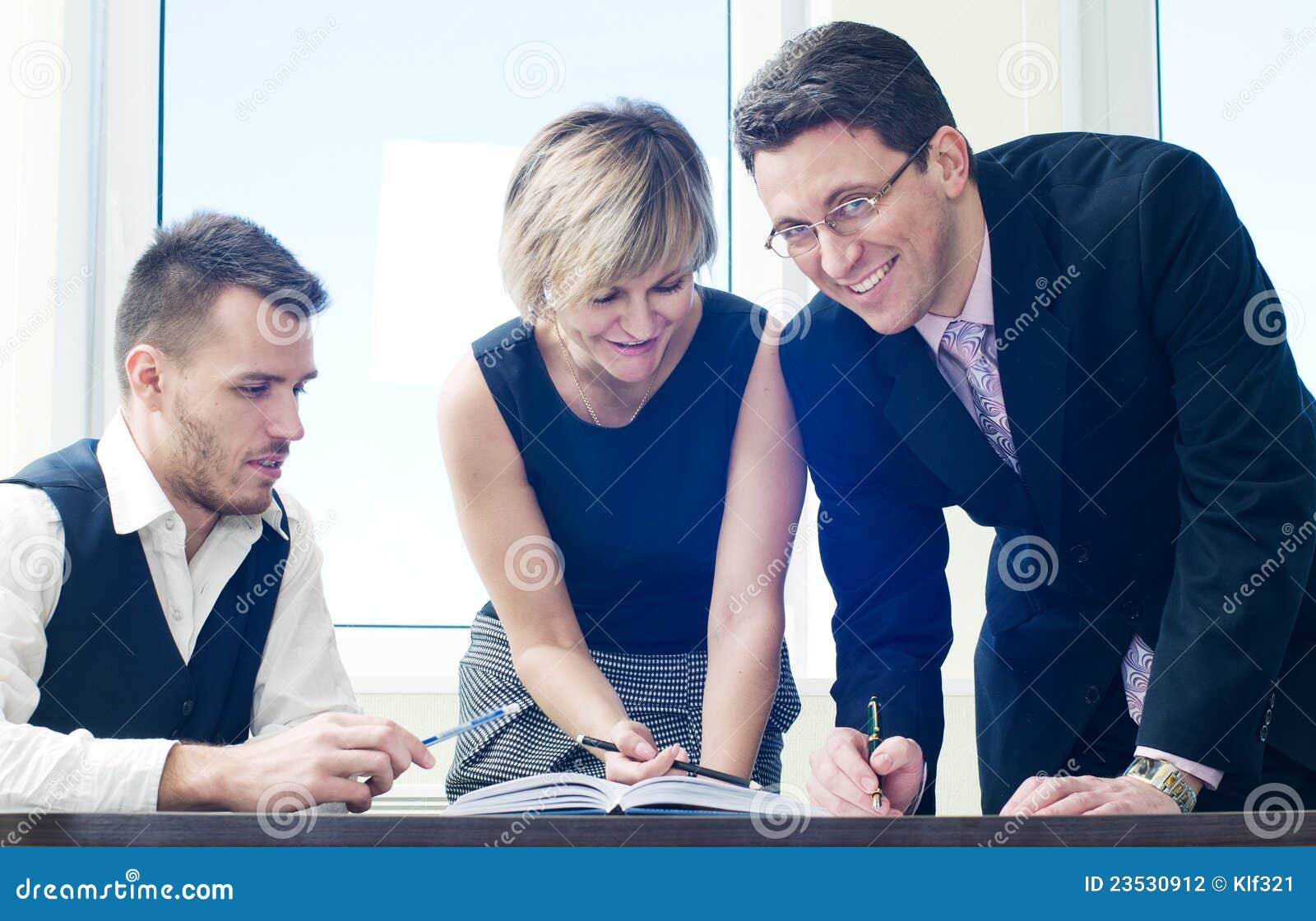 Business Team in Discussion Stock Photo - Image of businessman, female ...