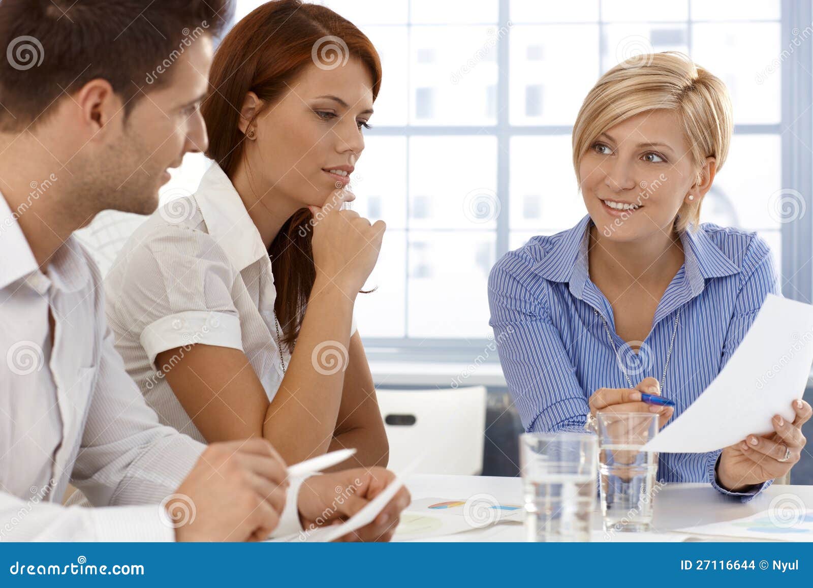 Business Team in Discussion Stock Photo - Image of documents ...