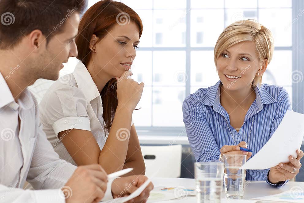 Business Team in Discussion Stock Photo - Image of documents ...