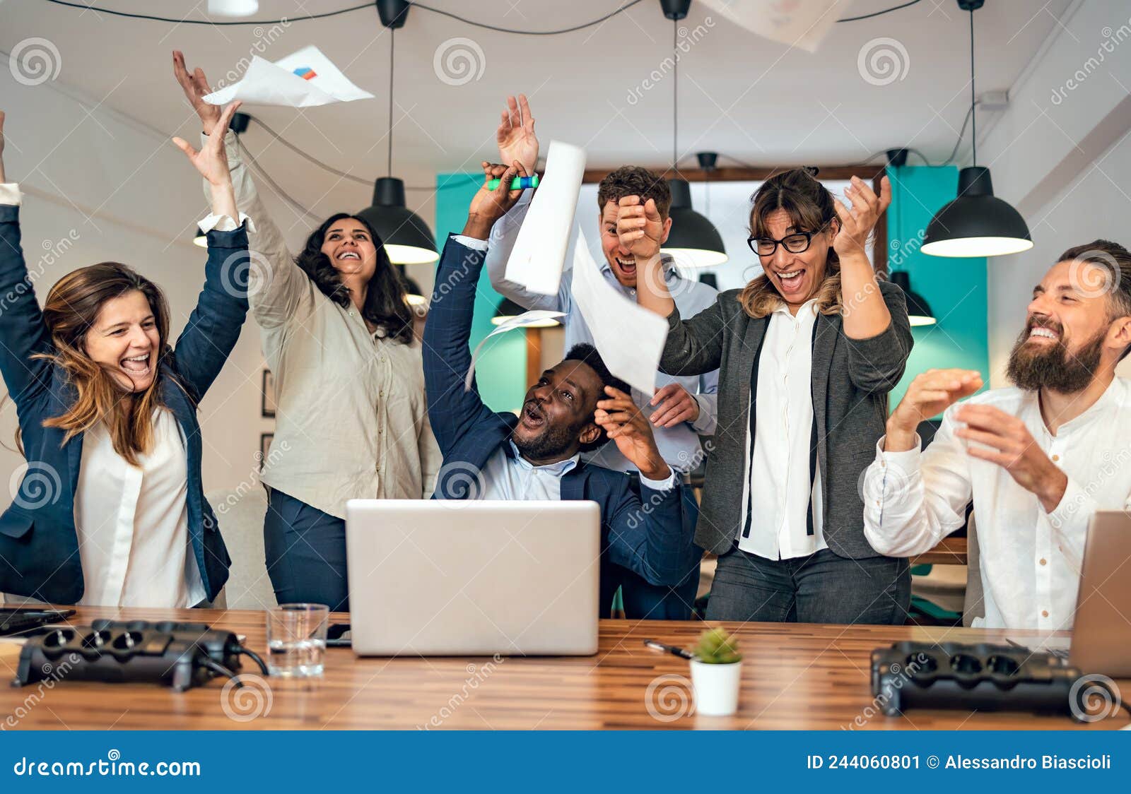 Business Team of Diverse People Celebrating Successful Work in Modern ...