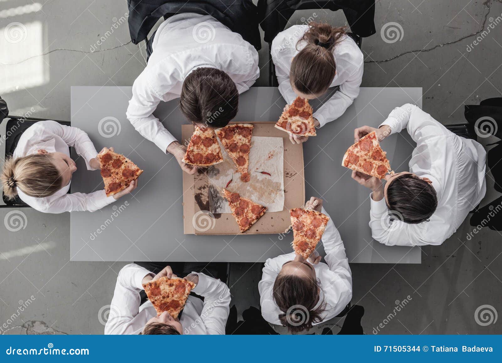 Business team eating pizza stock photo. Image of lunch - 71505344