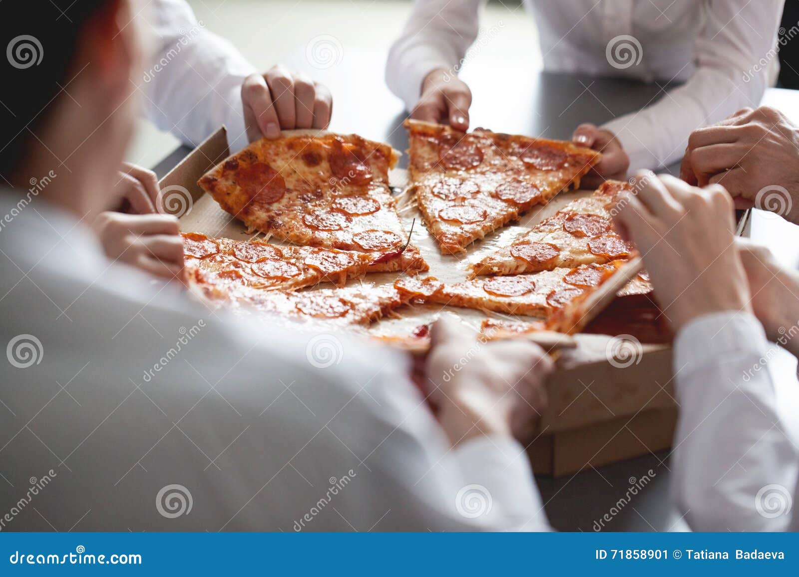 Business team eating pizza stock image. Image of corporate - 71858901