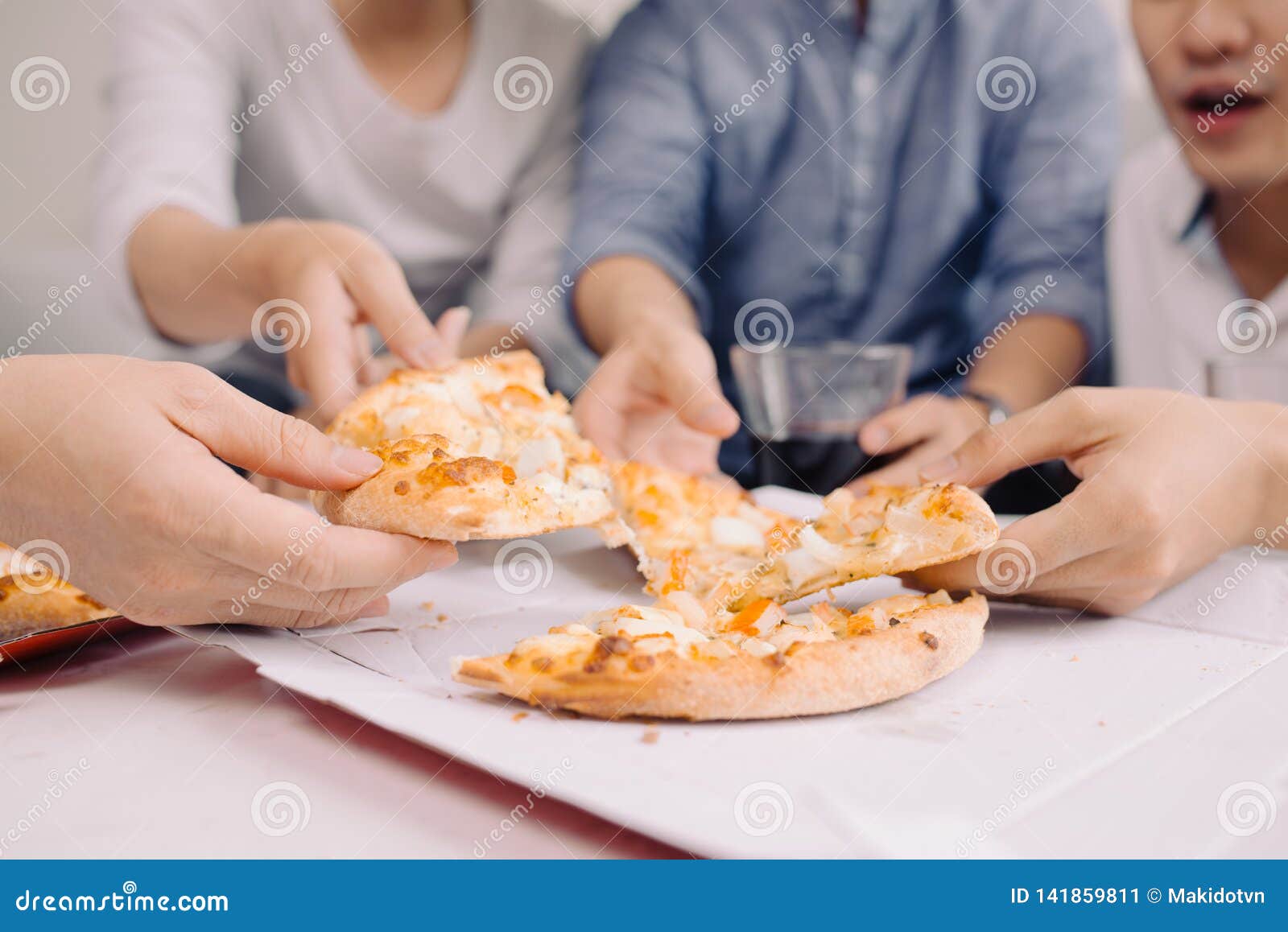Business Team is Eating Pizza at Work while Working Stock Image - Image ...