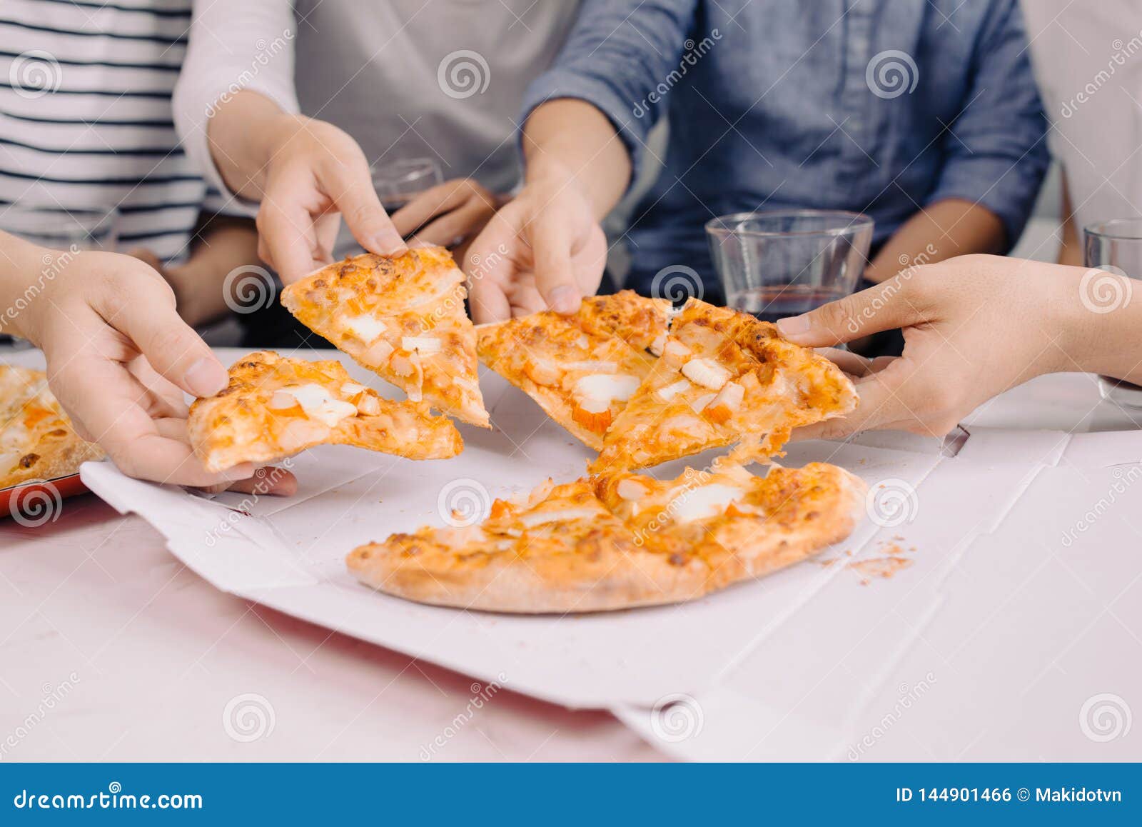 Business Team is Eating Pizza at Work while Working Stock Photo - Image ...