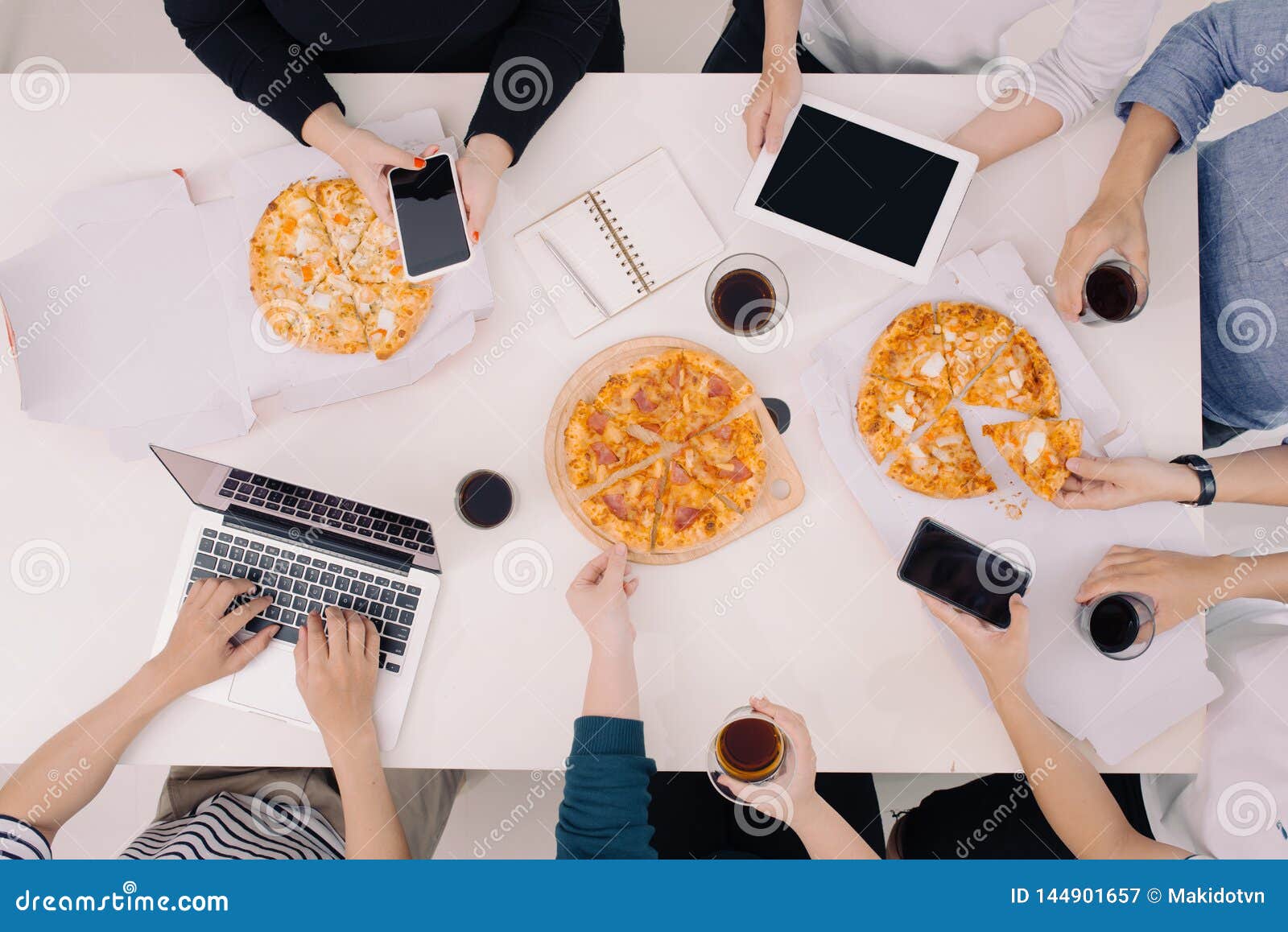 Business Team is Eating Pizza at Work while Working Stock Image - Image ...
