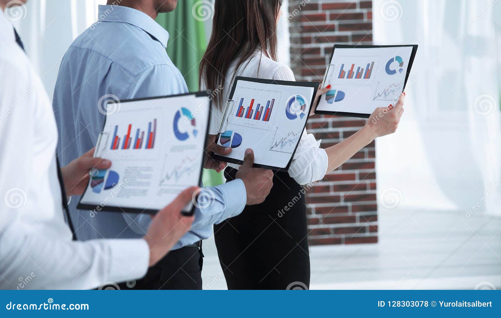 Business Team with Financial Reporting Standing in the Office. Stock ...