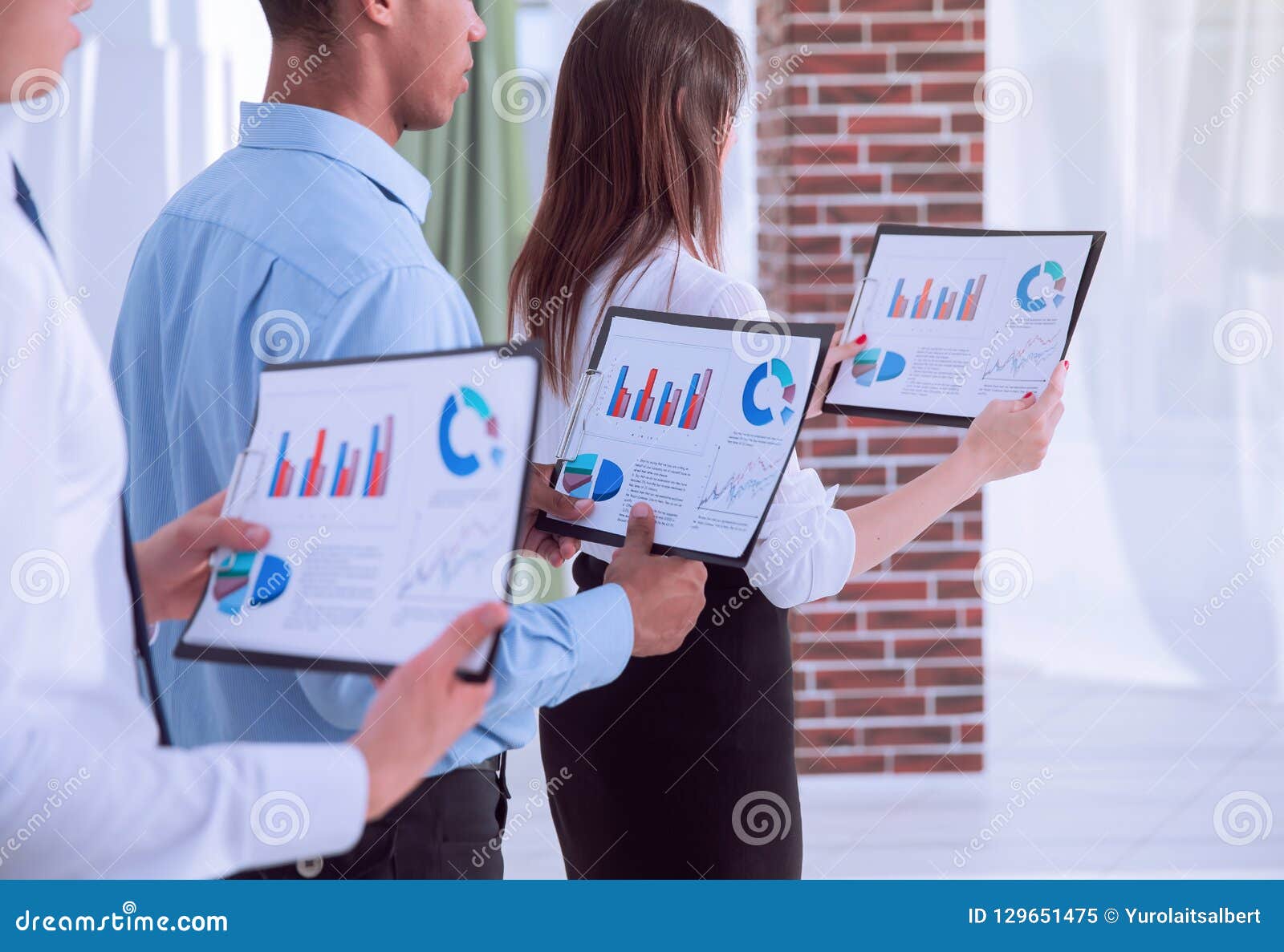 Business Team with Financial Reporting Standing in the Office. Stock ...