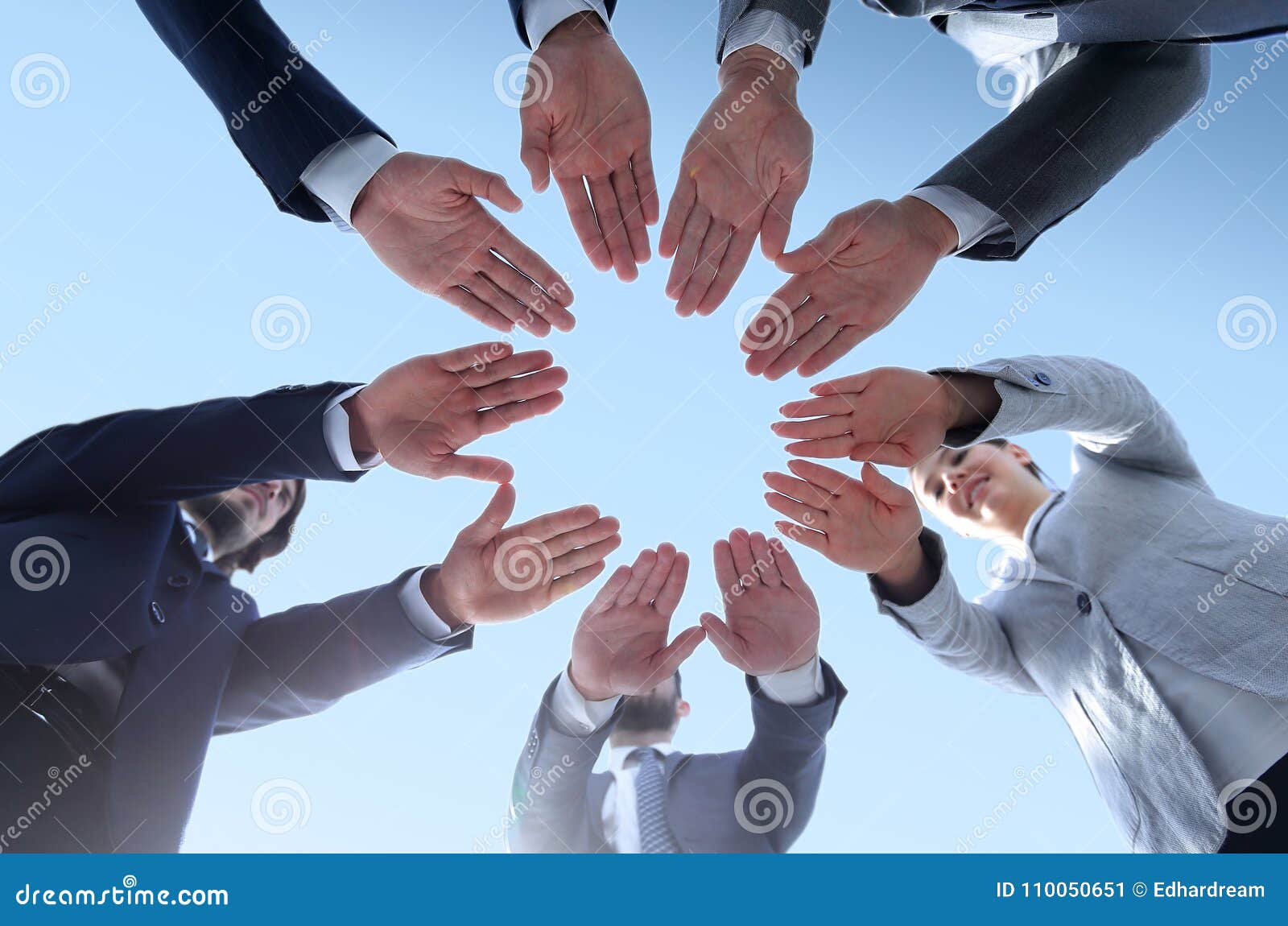 Business Team with Folded Their Hands in a Circle Stock Image - Image ...