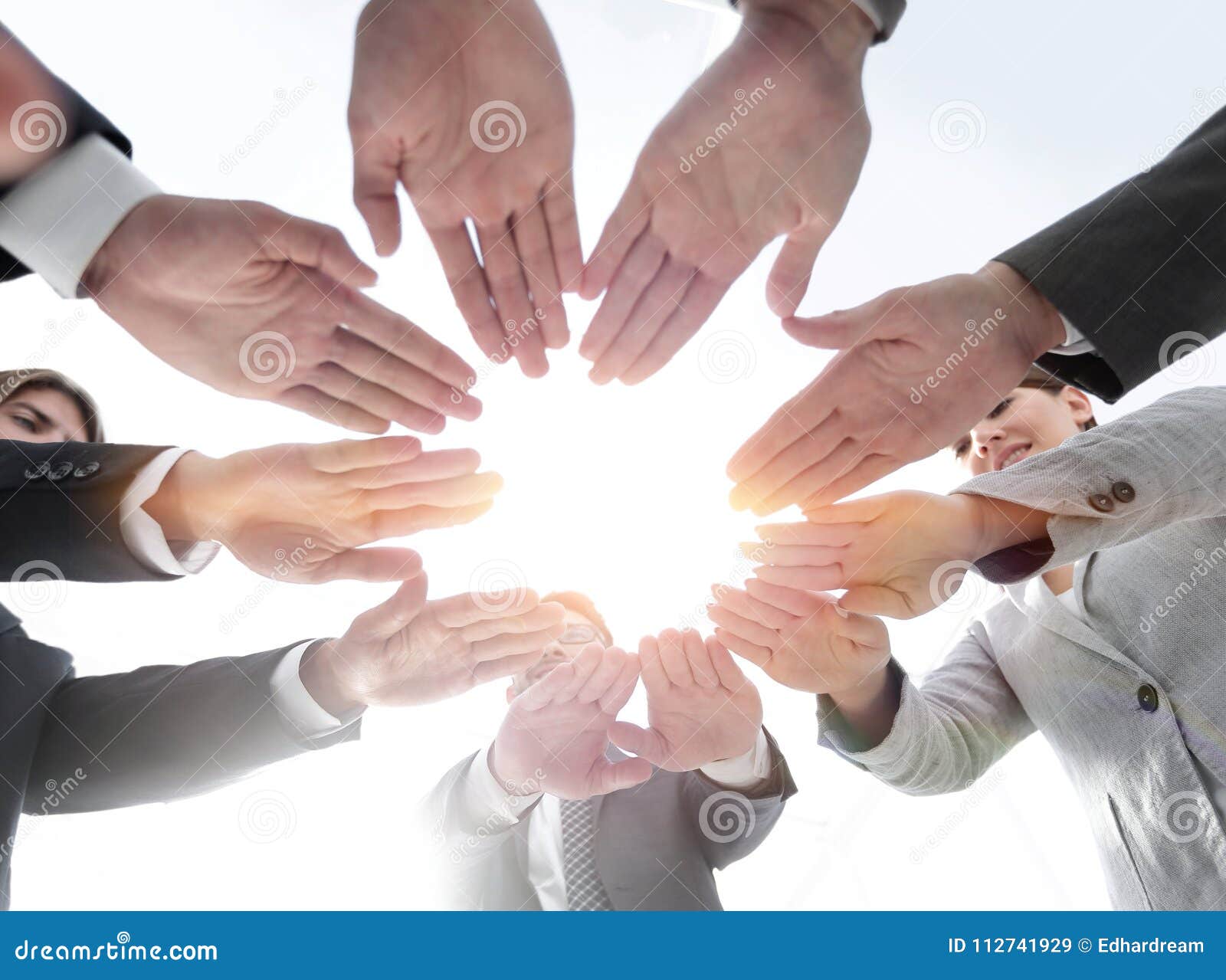 Business Team with Folded Their Hands in a Circle Stock Image - Image ...