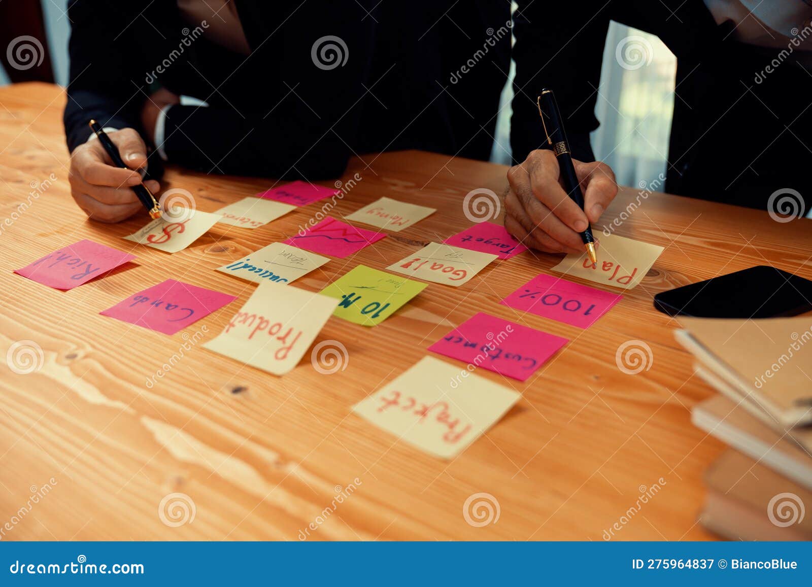 Business Team Gather on Table, Brainstorming and Writing Creative Idea ...