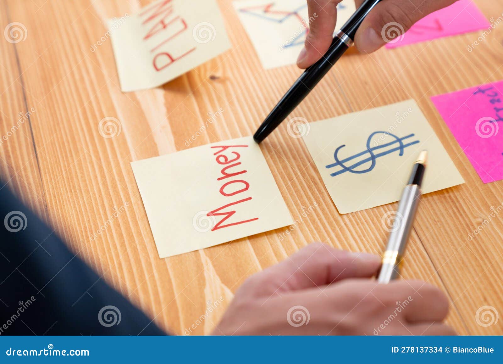 Business Team Gather on Table, Brainstorming and Writing Creative Idea ...