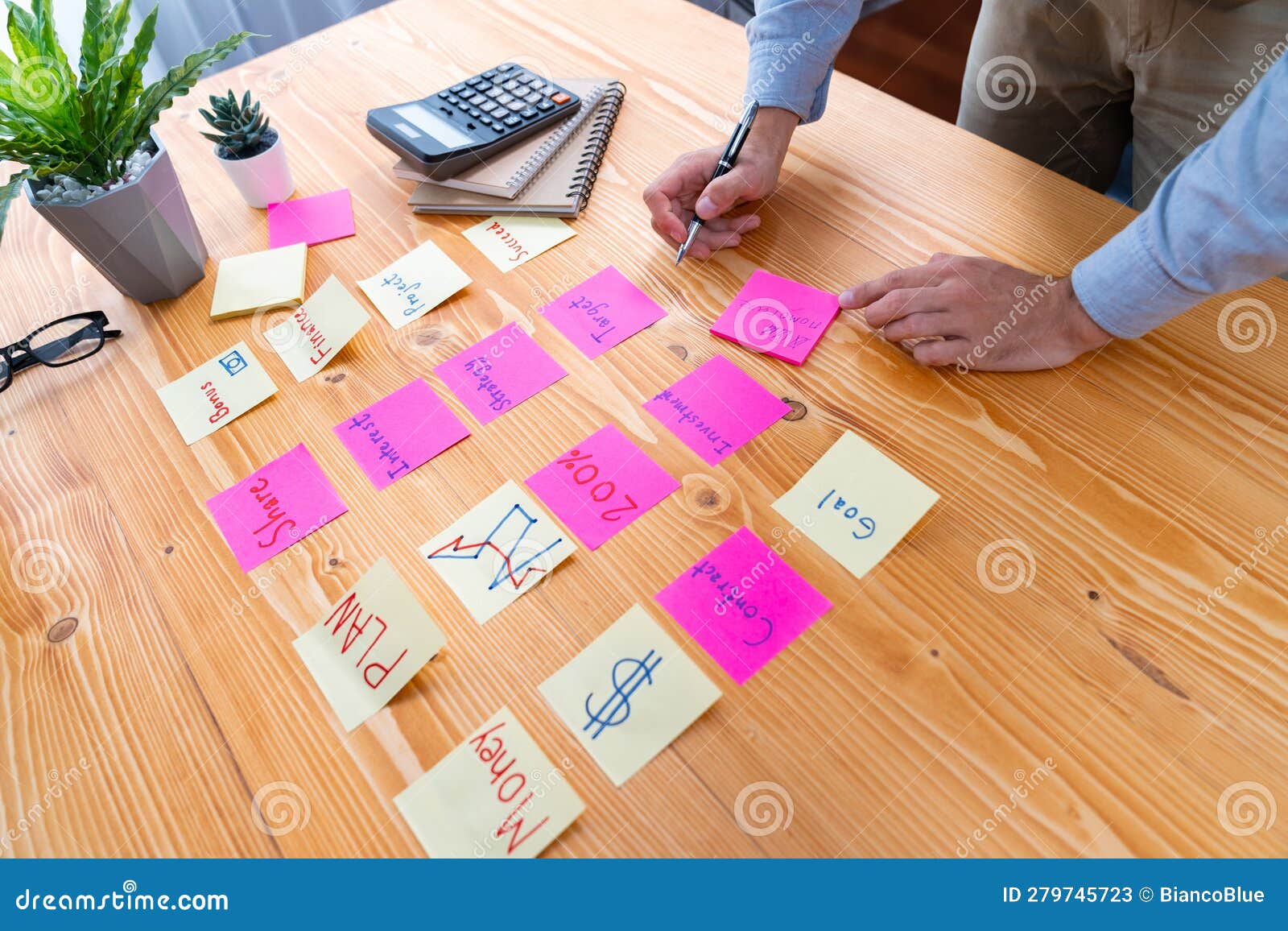 Business Team Gather on Table, Brainstorming and Writing Creative Idea ...