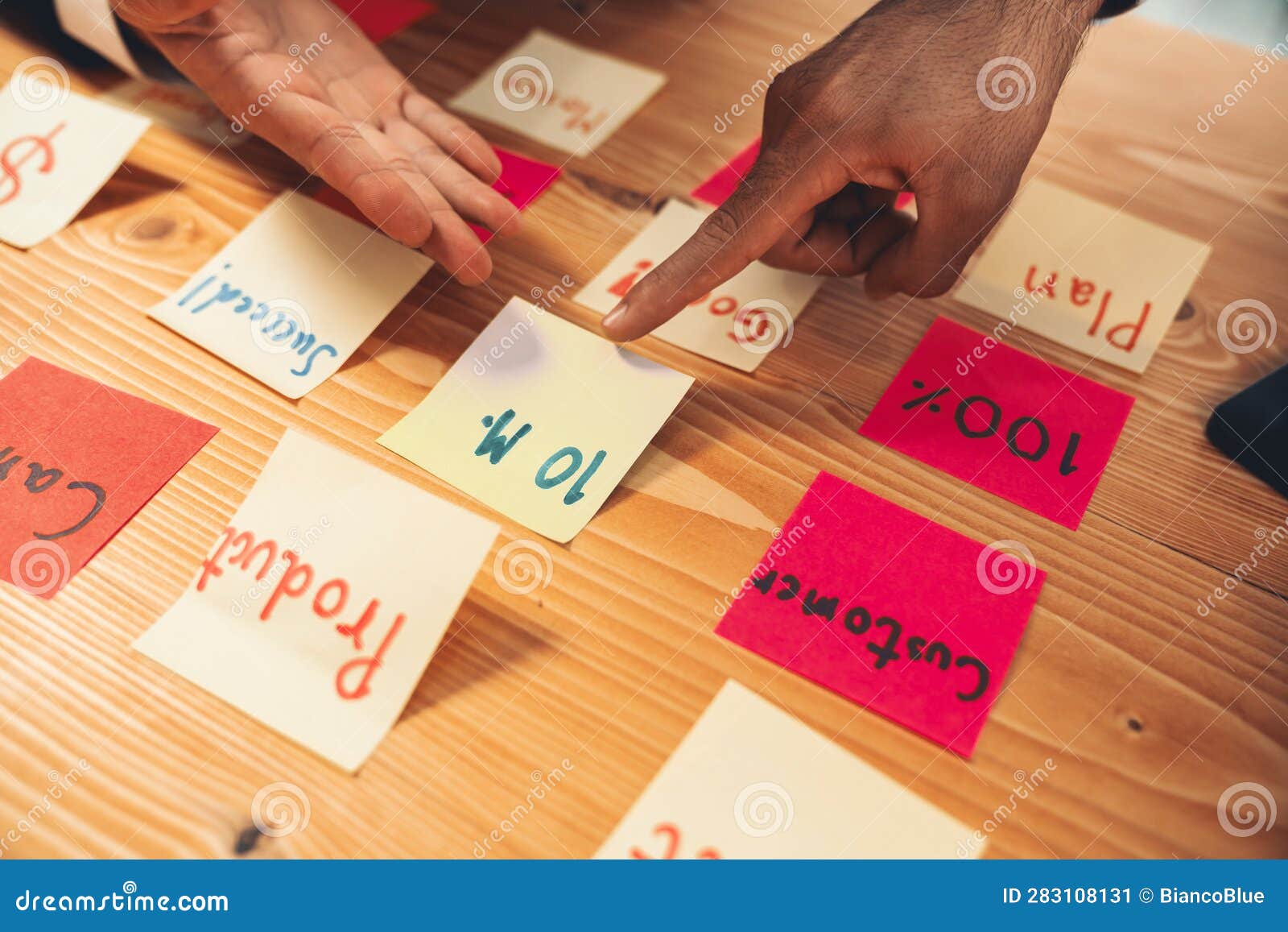 Business Team Gather on Table, Brainstorming and Writing Creative Idea ...