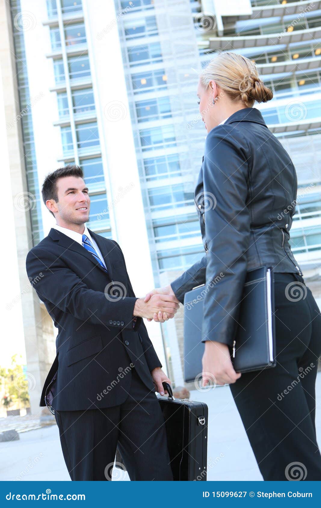 Business Team Handshake stock image. Image of building - 15099627