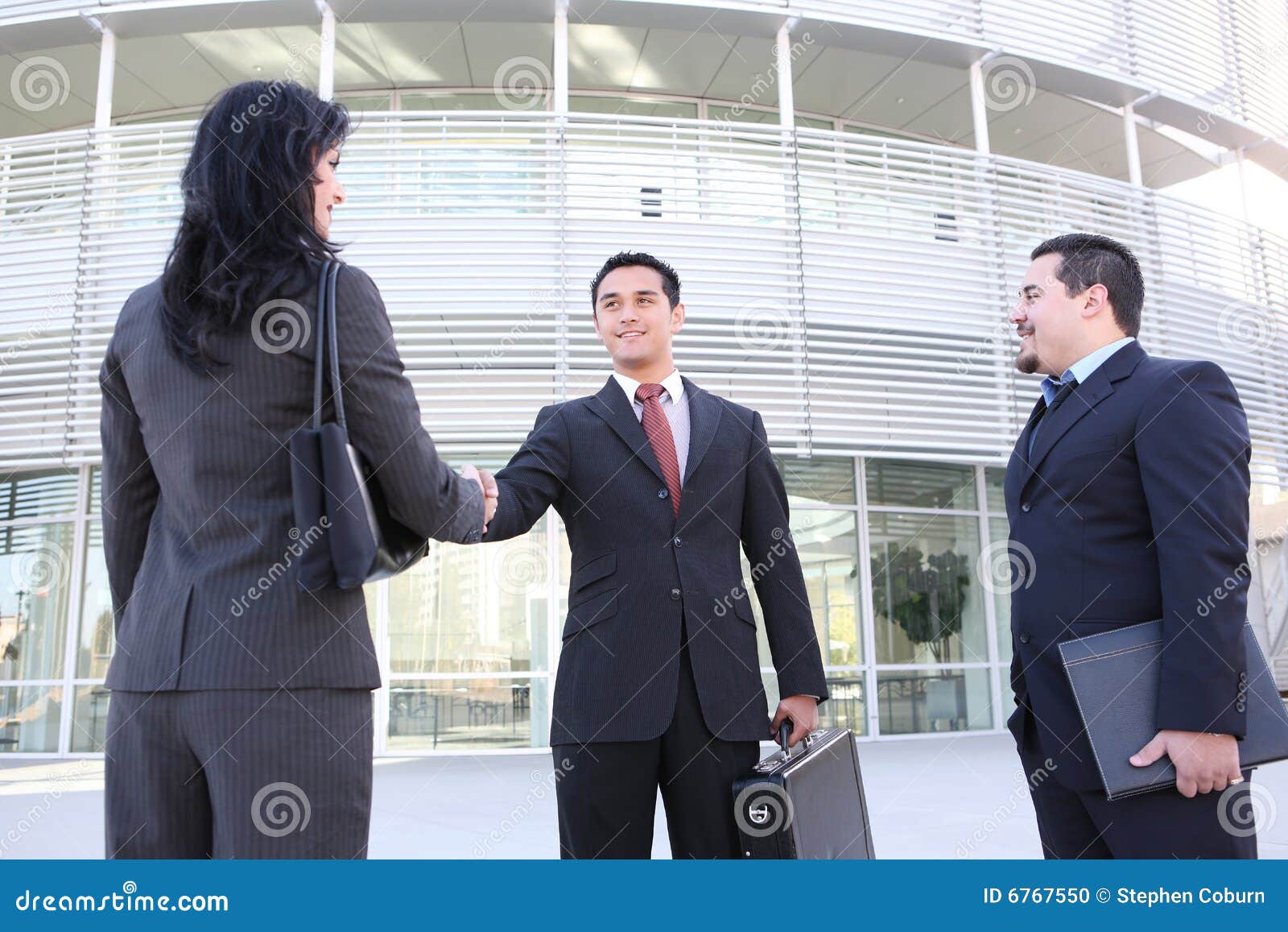 Business Team Handshake stock photo. Image of hispanic - 6767550