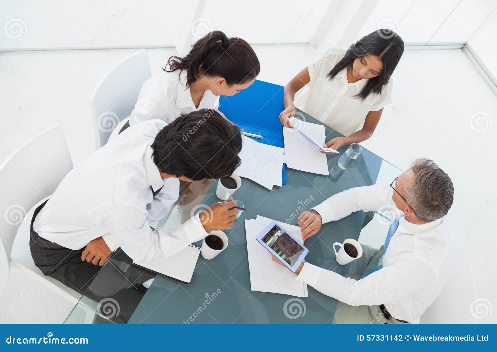 Business team hard at work stock photo. Image of desk - 57331142