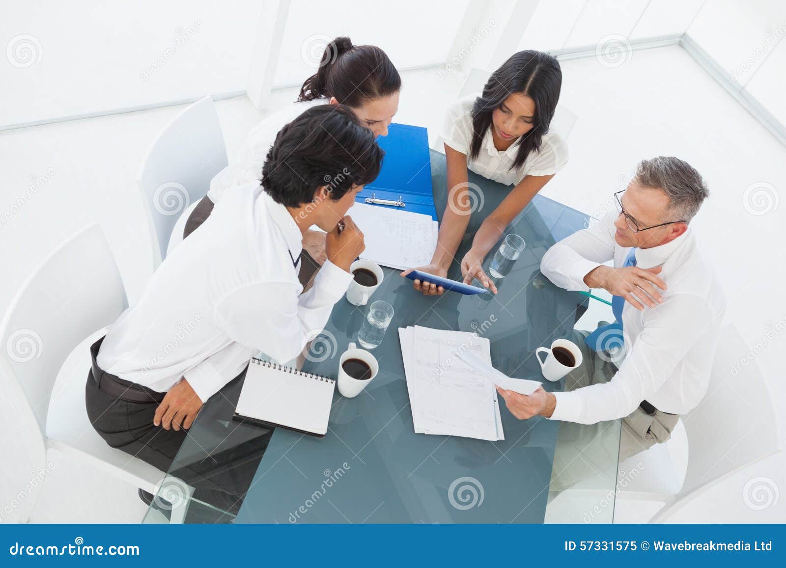Business team hard at work stock image. Image of adult - 57331575