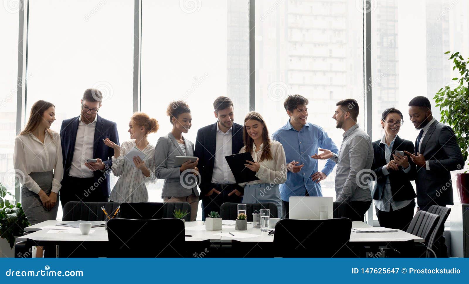 Business Team Having Break, Standing Near Window Stock Image - Image of ...