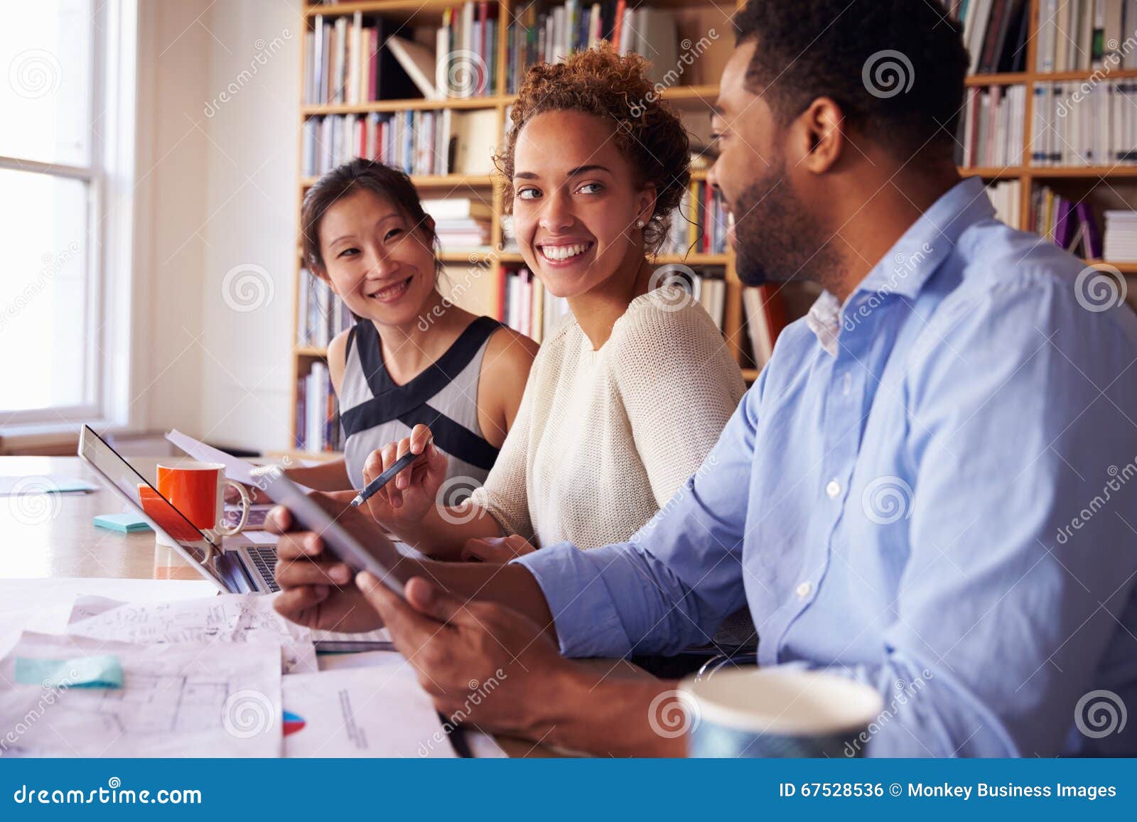 Business Team Having Meeting in Busy Office Stock Photo - Image of ...