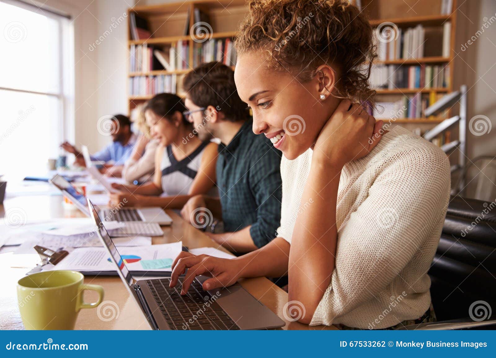 Business Team Having Meeting in Busy Office Stock Photo - Image of ...