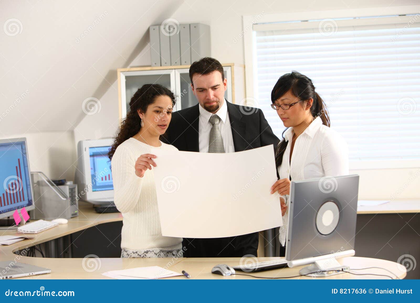 Business Team Holding Paper Stock Photo - Image of commerce, multi: 8217636