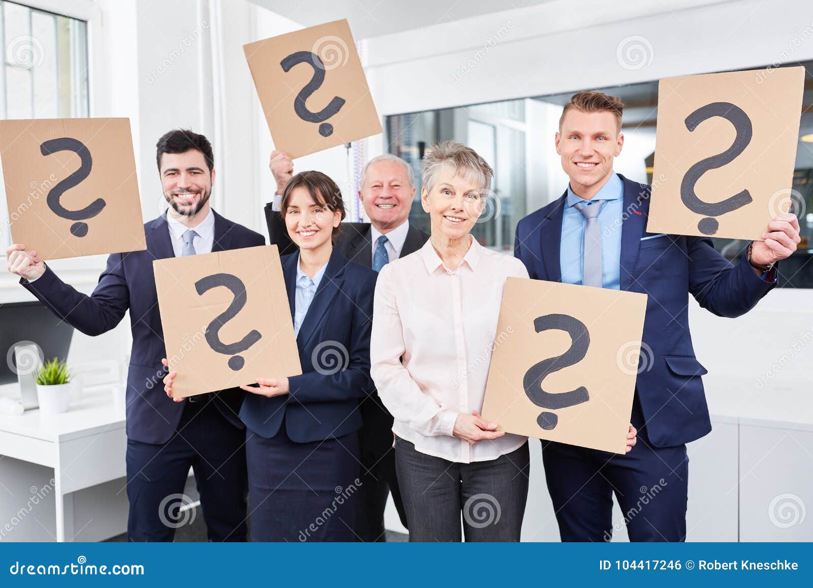 Business Team Holding Question Marks Stock Photo - Image of group ...
