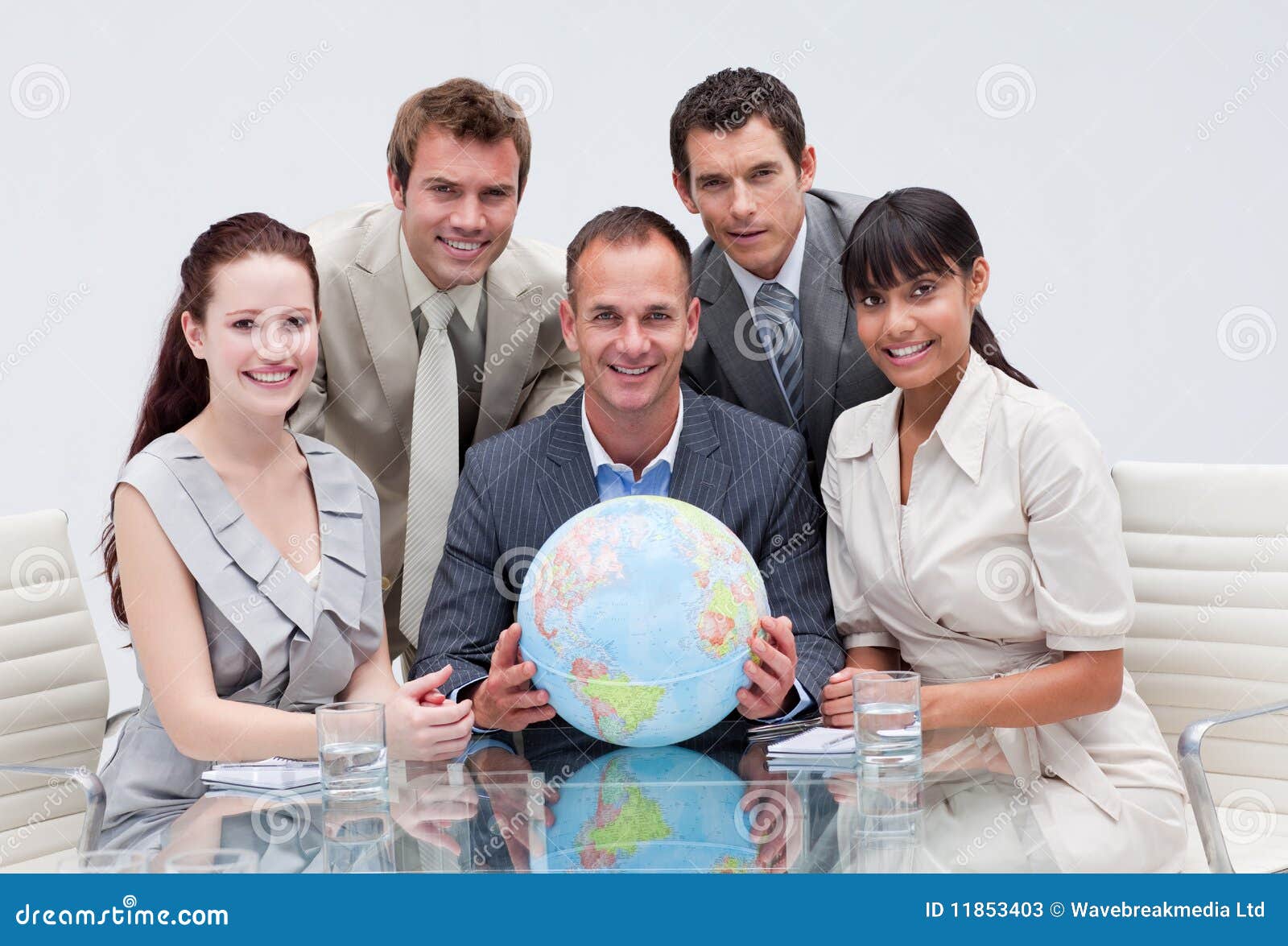 Business Team Holding a Terrestrial Globe Stock Image - Image of female ...