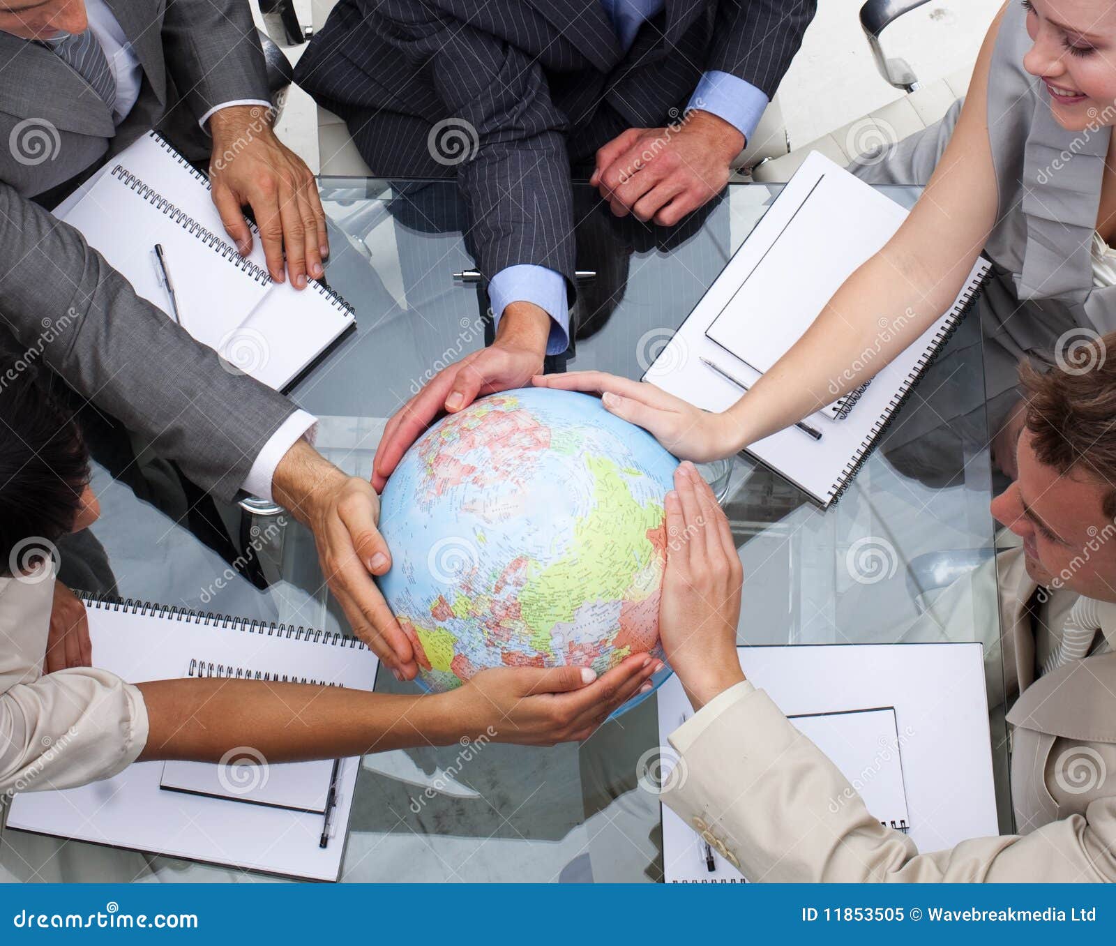 Business Team Holding a Terrestrial Globe Stock Image - Image of happy ...