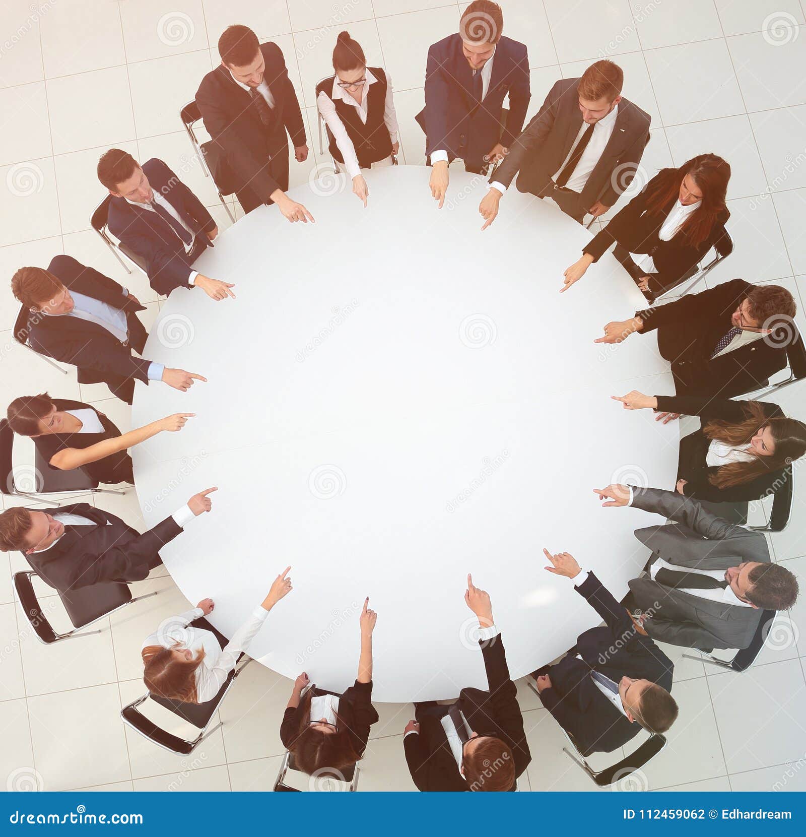 Business Team Indicates the Center of the Round Table. Stock Photo ...