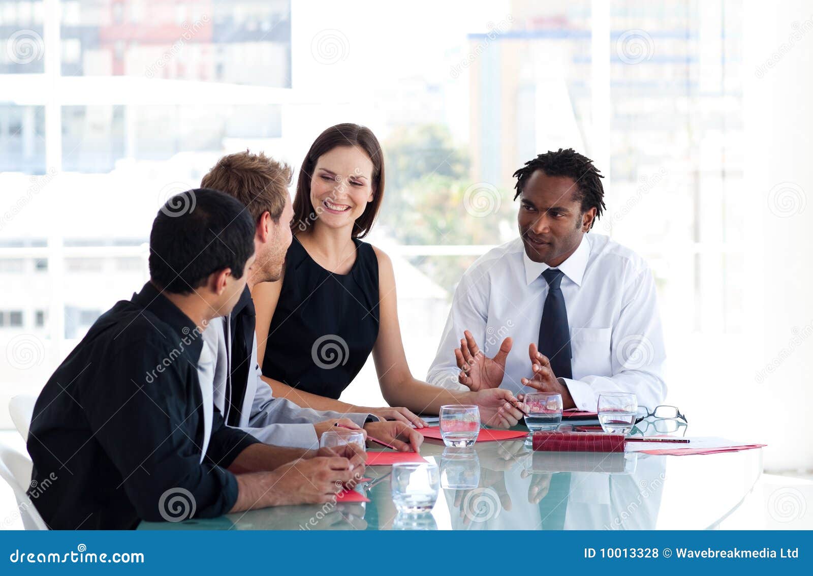 Business Team Interacting To Each Other in Office Stock Photo - Image ...