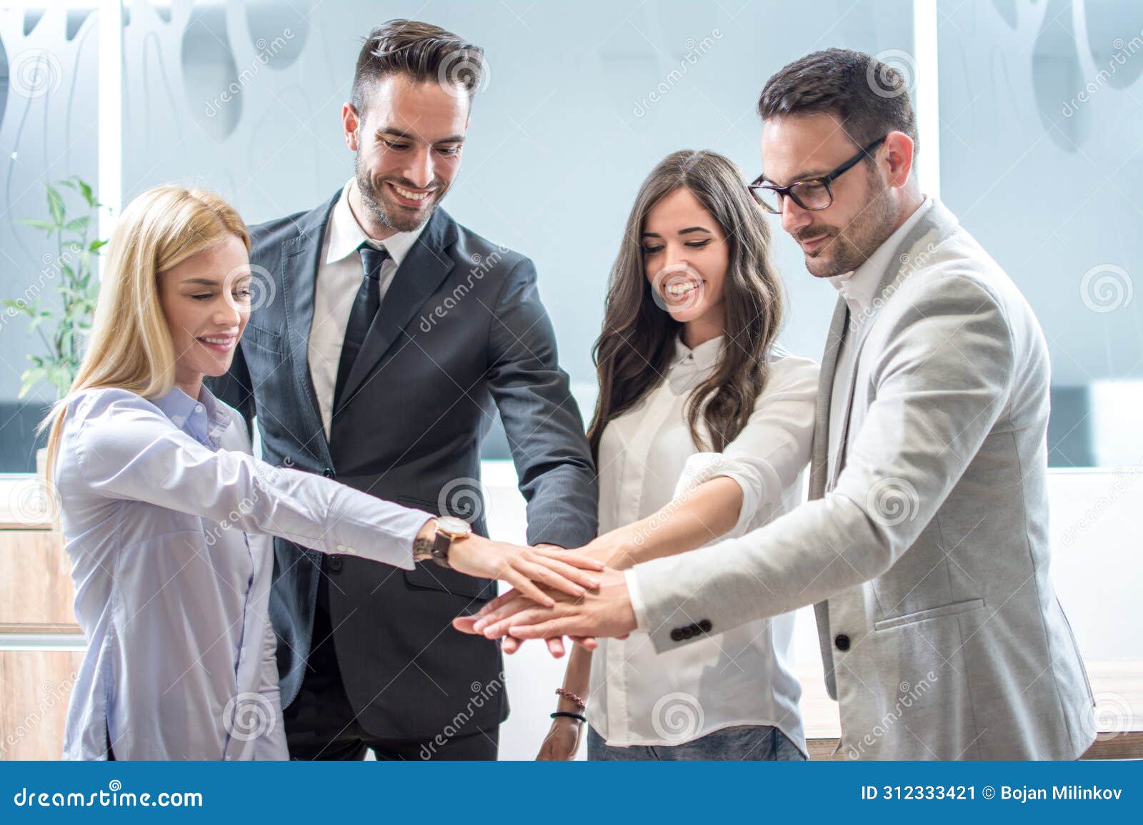 Business Team Join Hands Together in Office. Stock Image - Image of ...