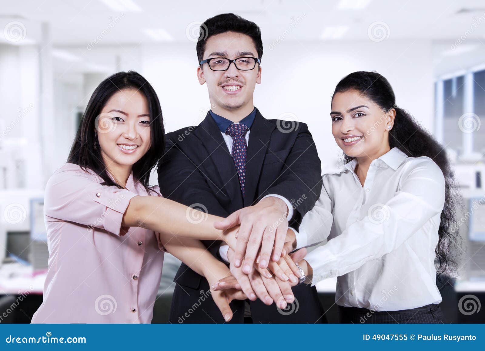Business Team Joining Hands in the Office Stock Image - Image of ...
