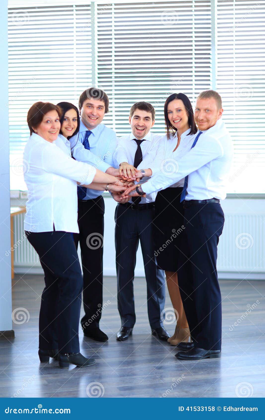 Business Team Joining Hands Stock Photo - Image of casual, partnership ...