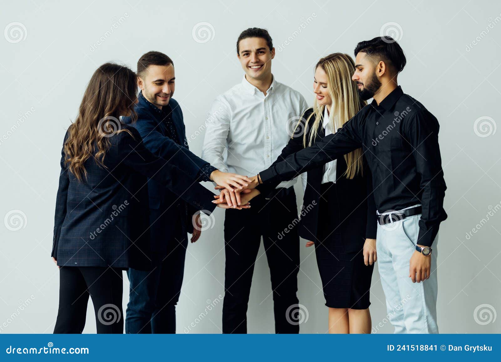 Business Team Joining Hands Together in Office Stock Image - Image of ...
