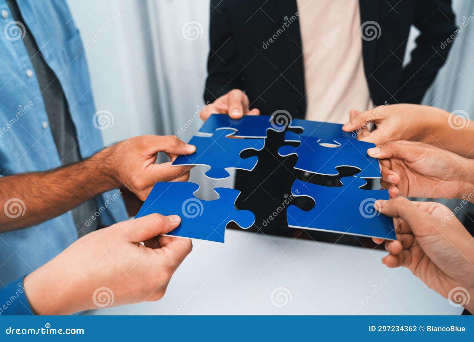 Business Team Joining Jigsaw Puzzle Together. Prudent Stock Photo ...