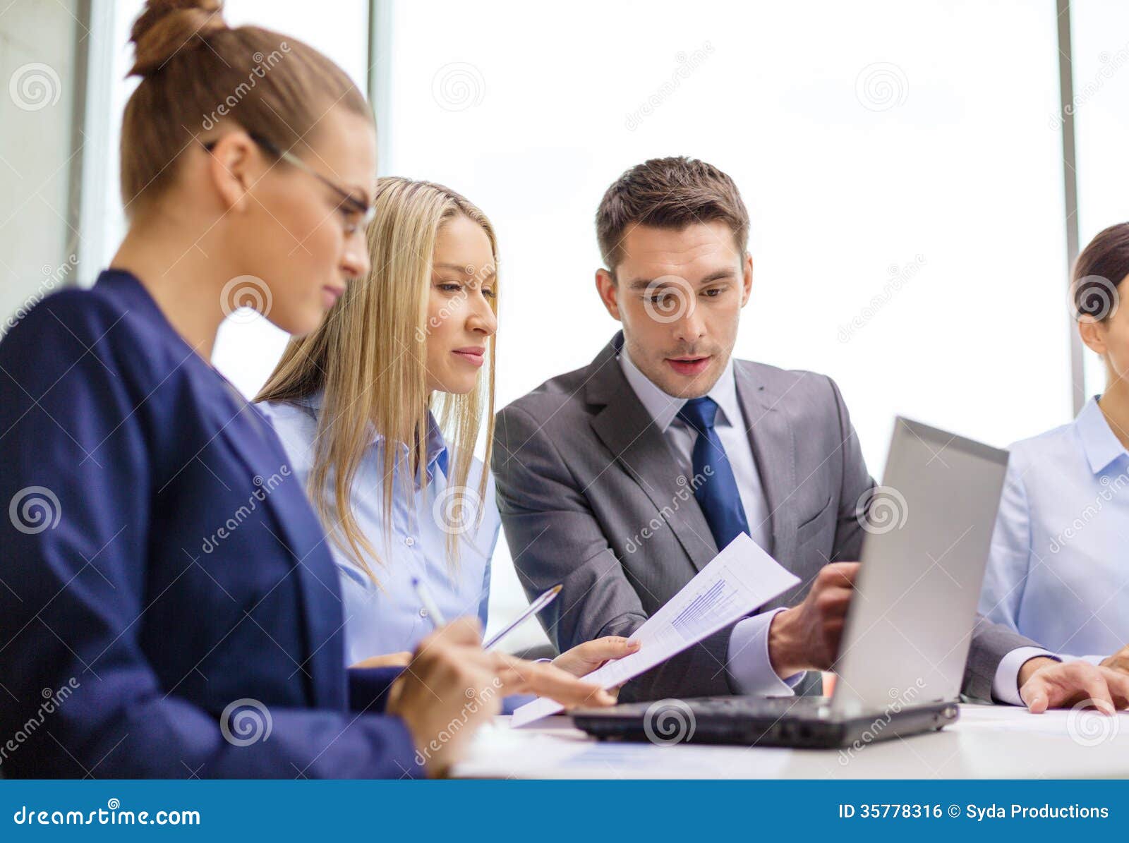 Business Team with Laptop Having Discussion Stock Photo - Image of ...