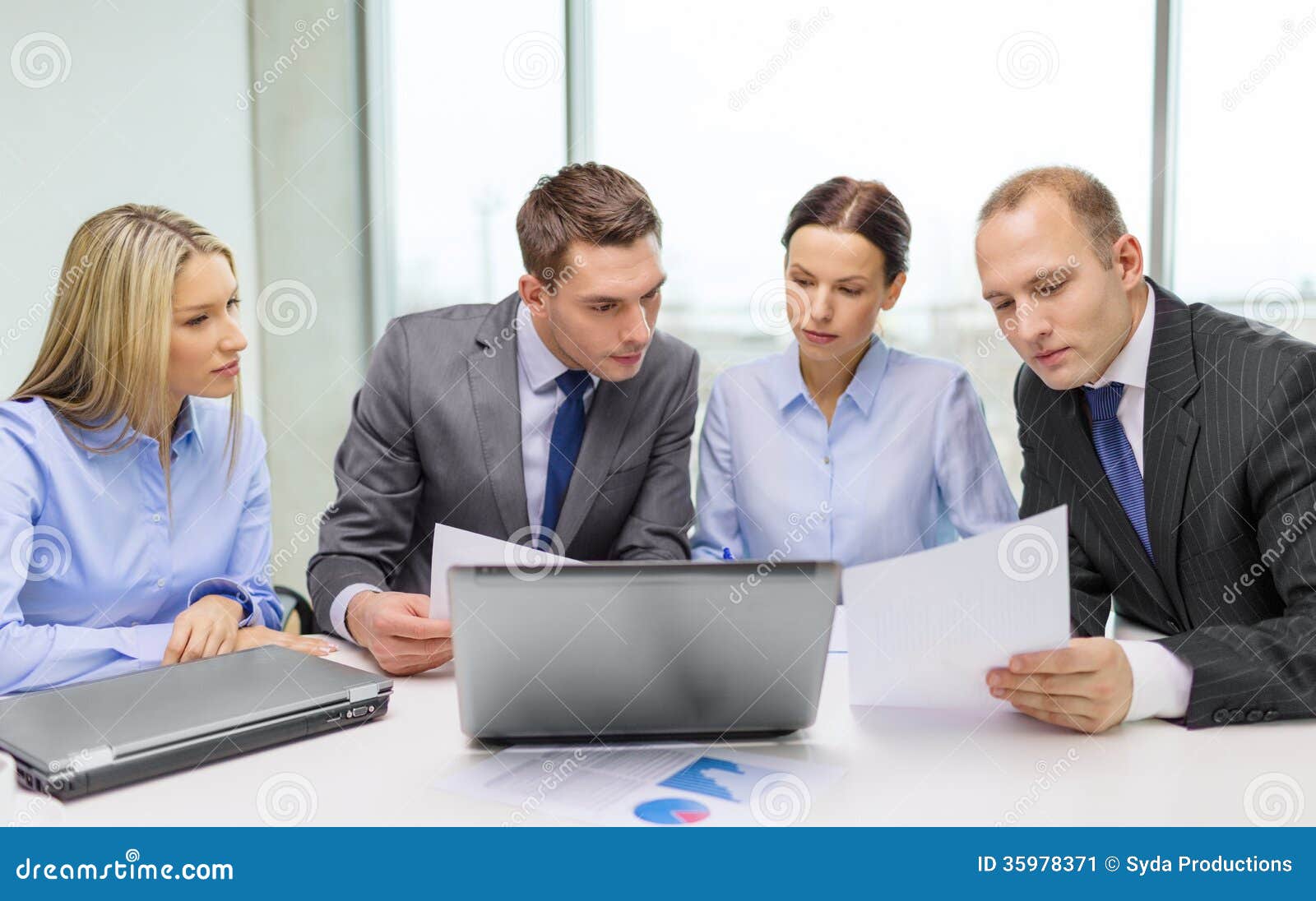 Business Team with Laptop Having Discussion Stock Image - Image of ...
