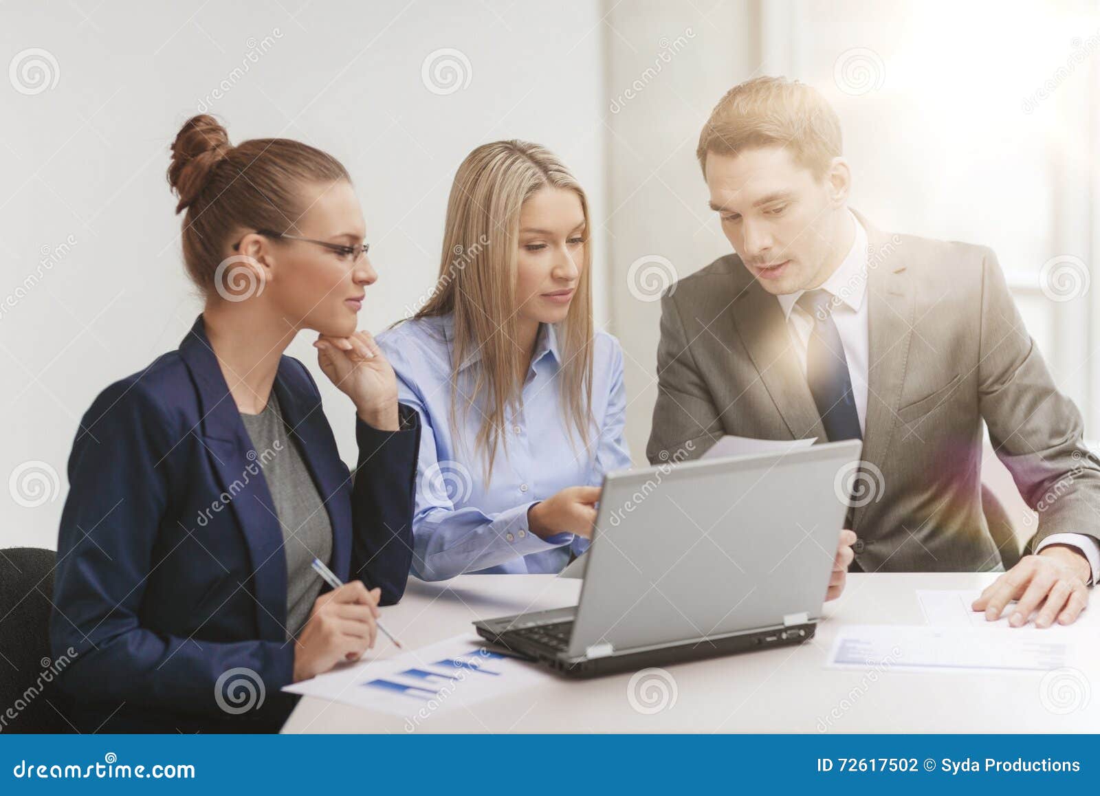 Business Team with Laptop Having Discussion Stock Photo - Image of ...