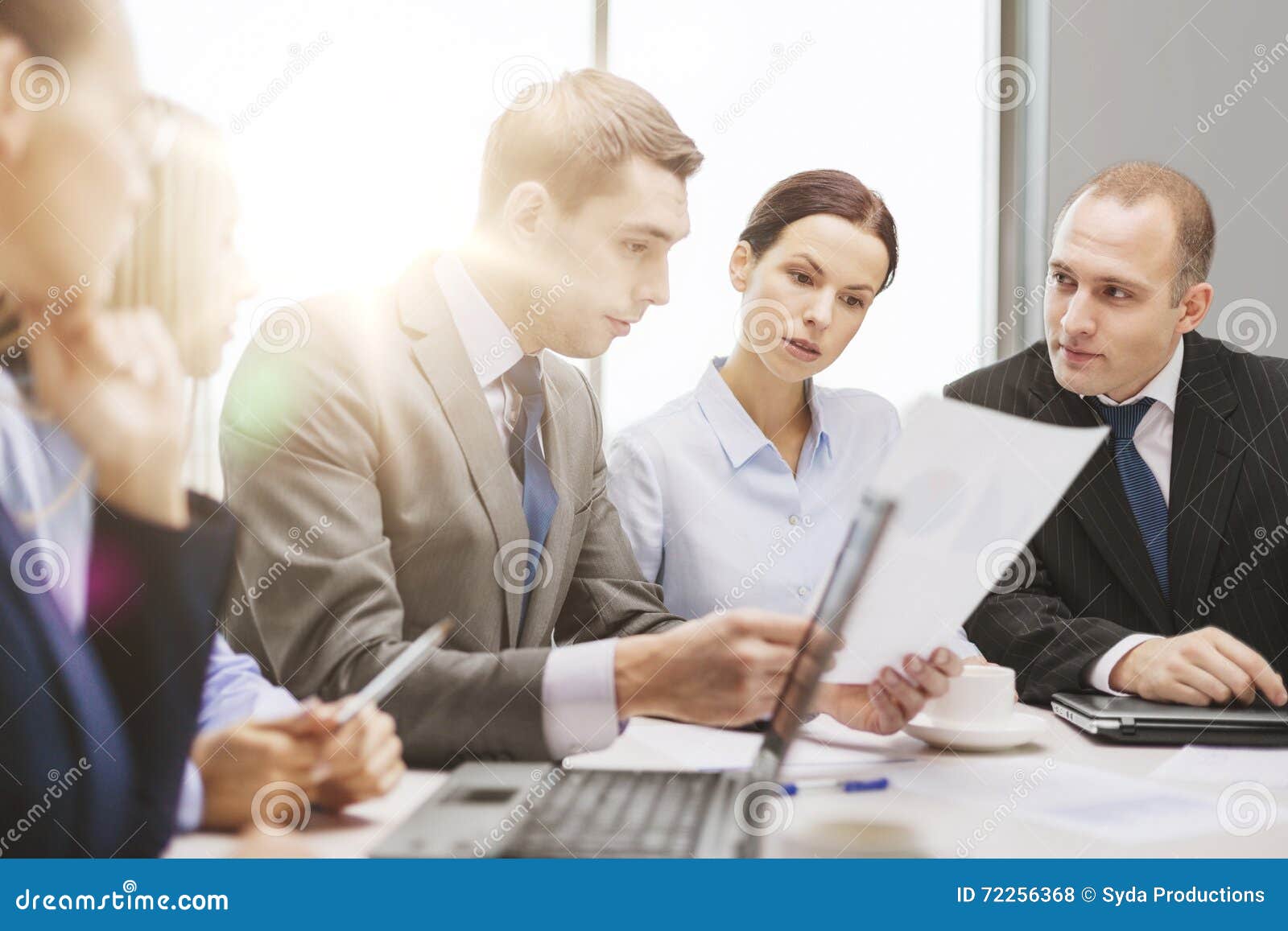 Business Team with Laptop Having Discussion Stock Photo - Image of ...