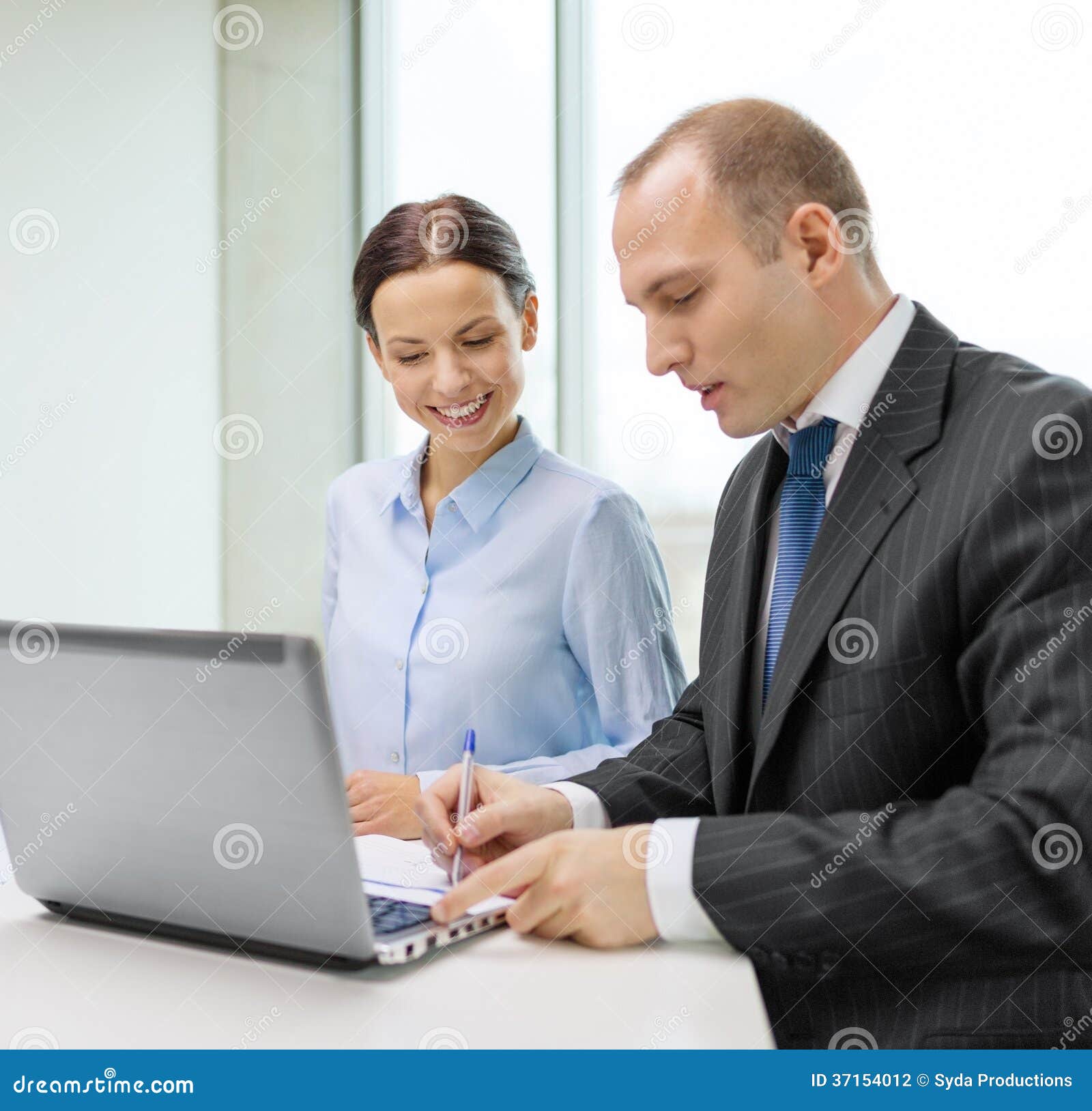 Business Team with Laptop Having Discussion Stock Photo - Image of ...