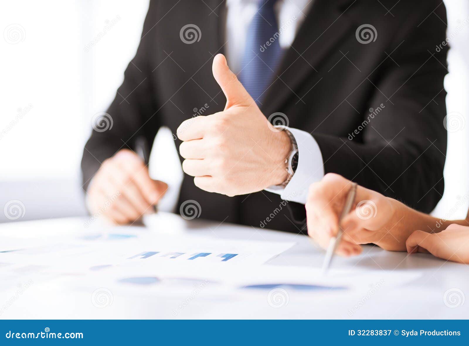 Business Team on Meeting Discussing Graphics Stock Image - Image of ...